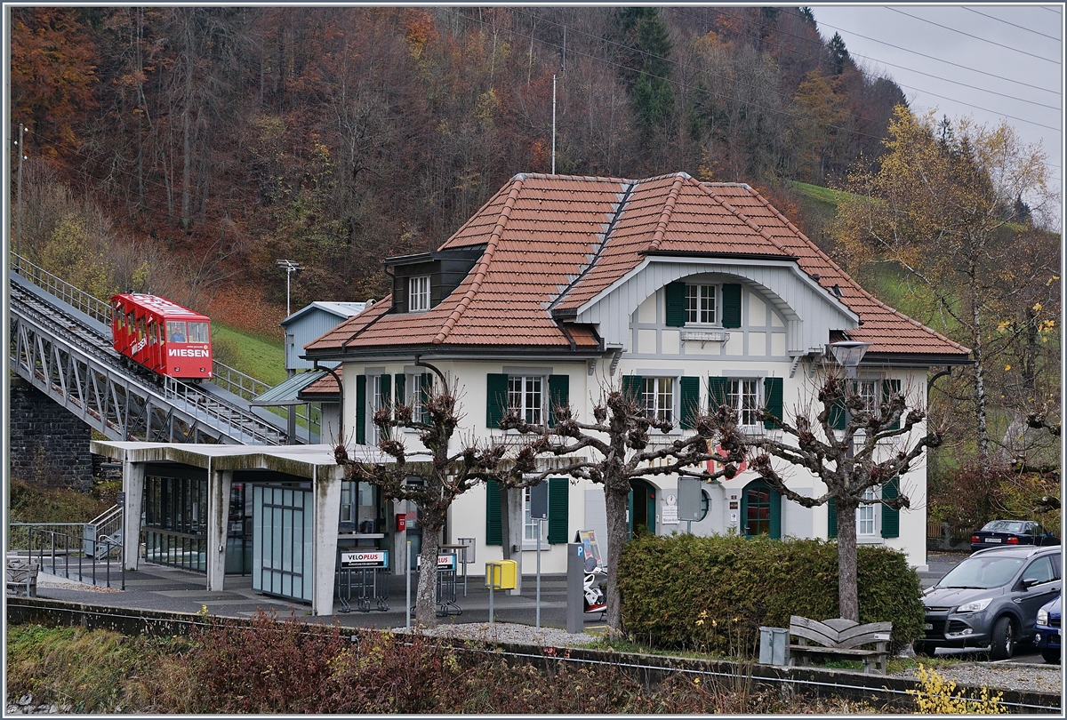 View from Niesen-Kulm (2362 m) on the track of the Niesen railway and a ...